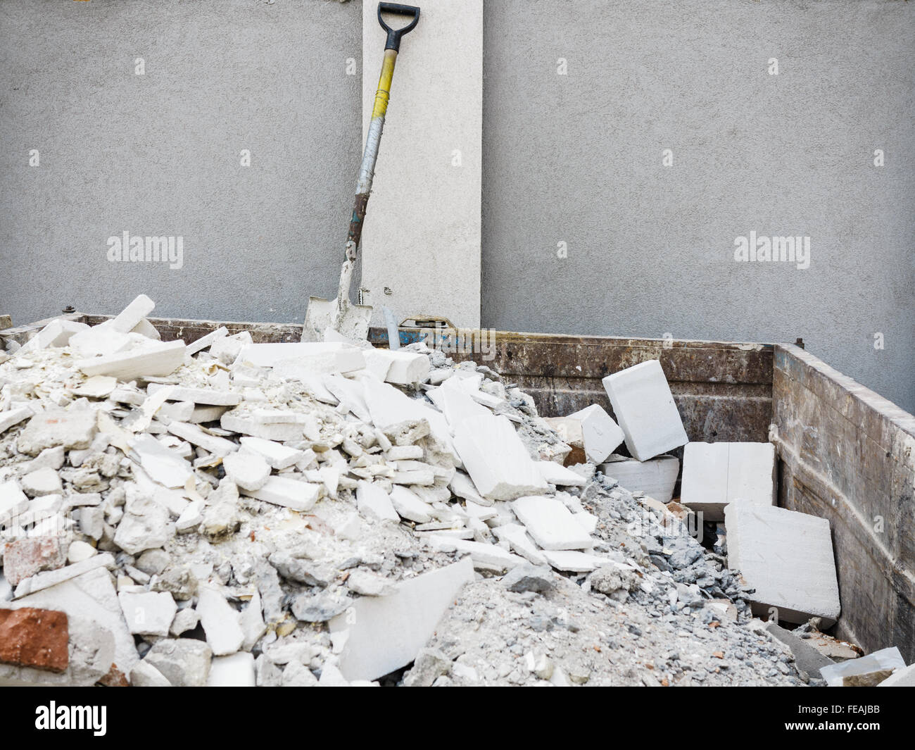 Full construction waste debris container, garbage bricks and material ...