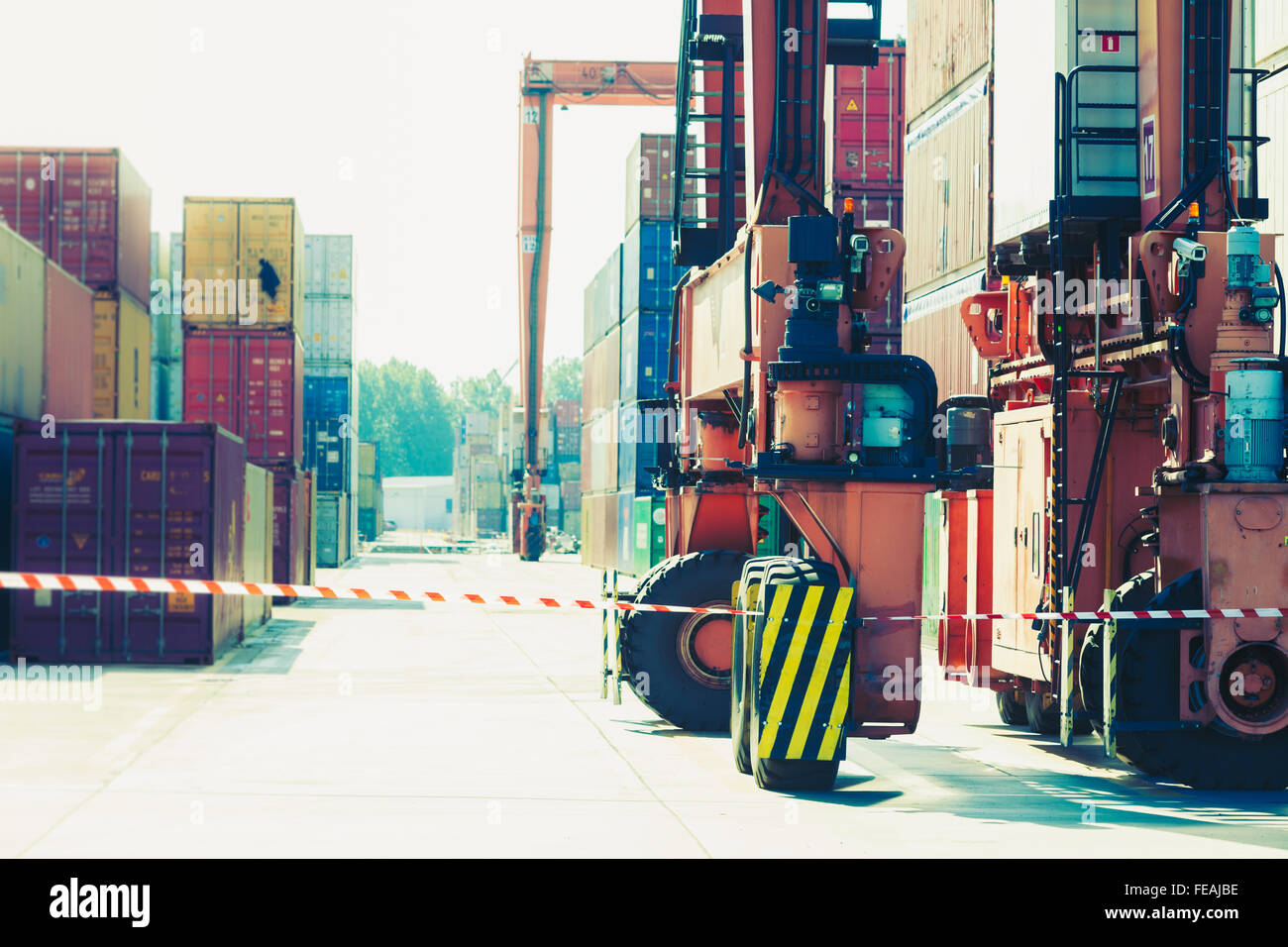 Business and commerce. Cranes at port area, cargo container yard ...