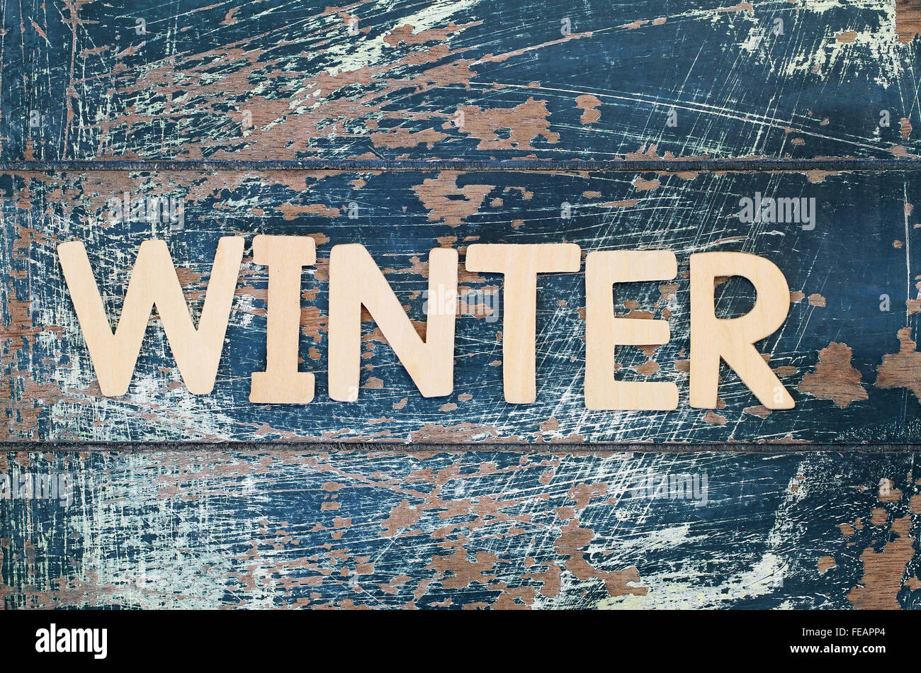 Word winter written with wooden letters on rustic surface Stock Photo ...