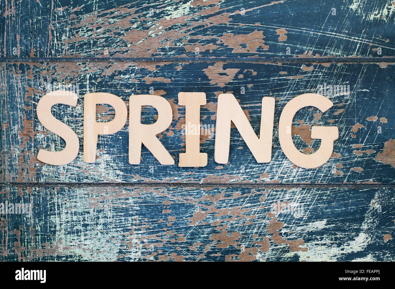 Word spring written with wooden letters on rustic surface Stock Photo ...