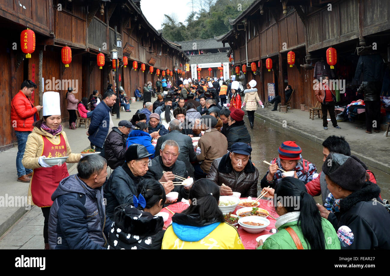 Chengdu, China's Sichuan Province. 4th Feb, 2016. People attend a long ...