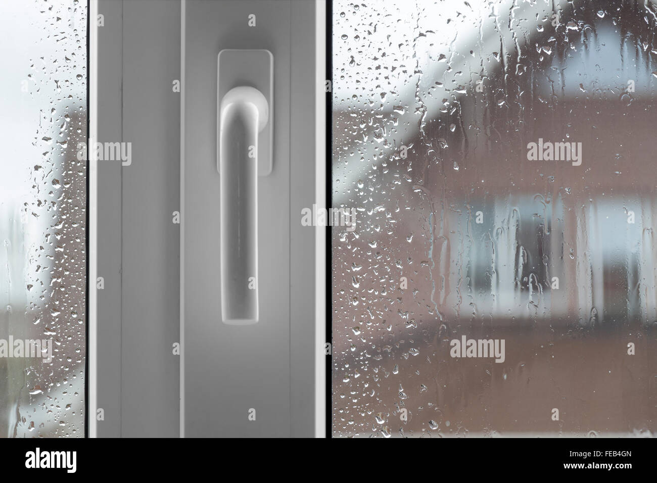Rain storm through window of house hi-res stock photography and images ...