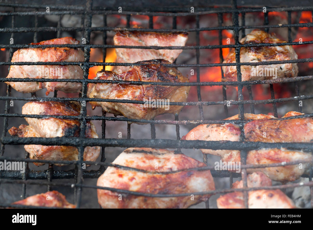Frying meat on the coals Stock Photo - Alamy