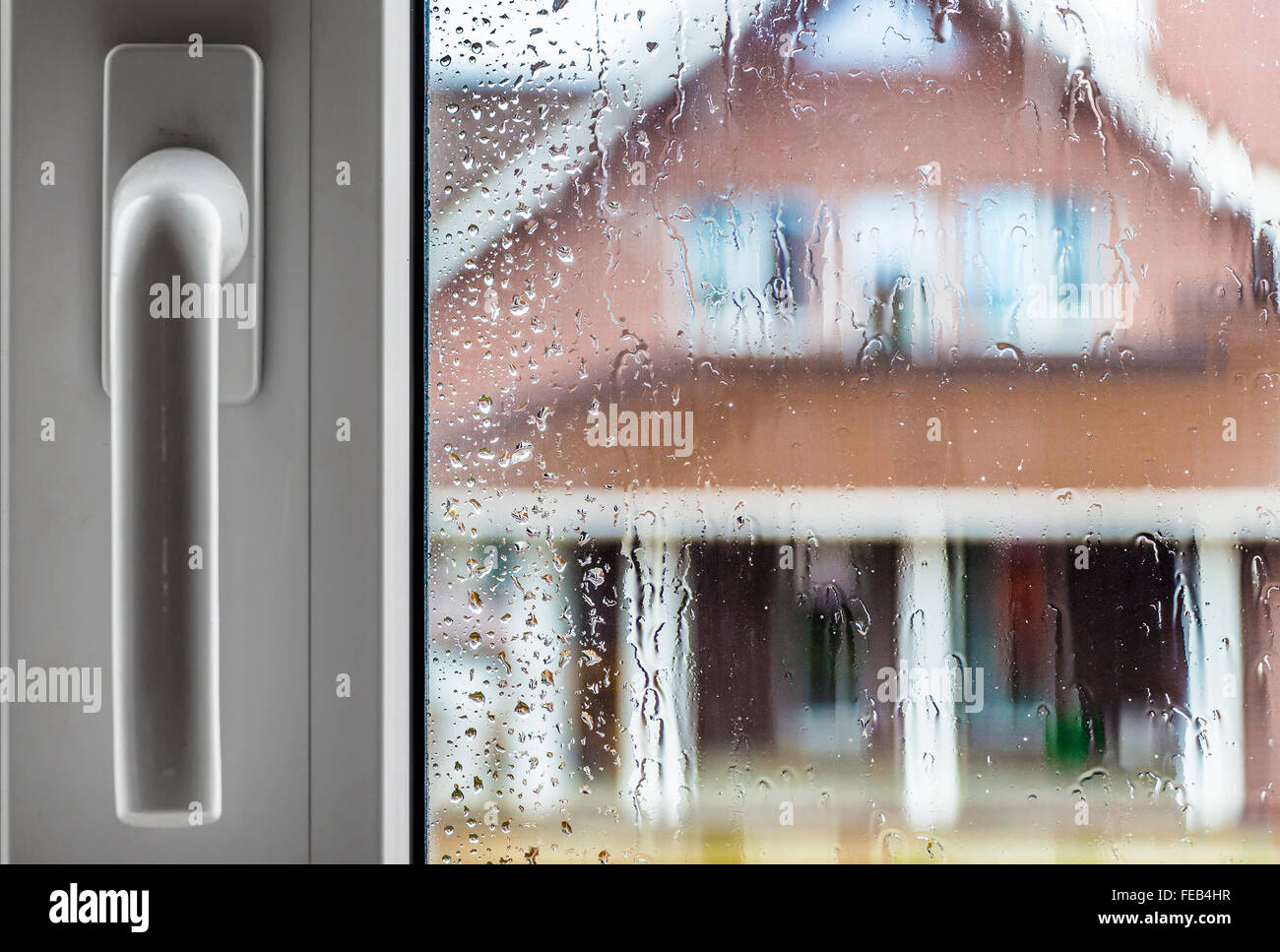 Rain storm through window of house hi-res stock photography and images ...