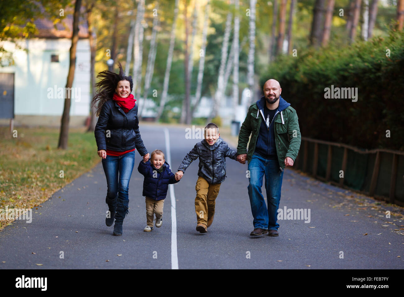 Happy family portrait on outdoor hi-res stock photography and images ...