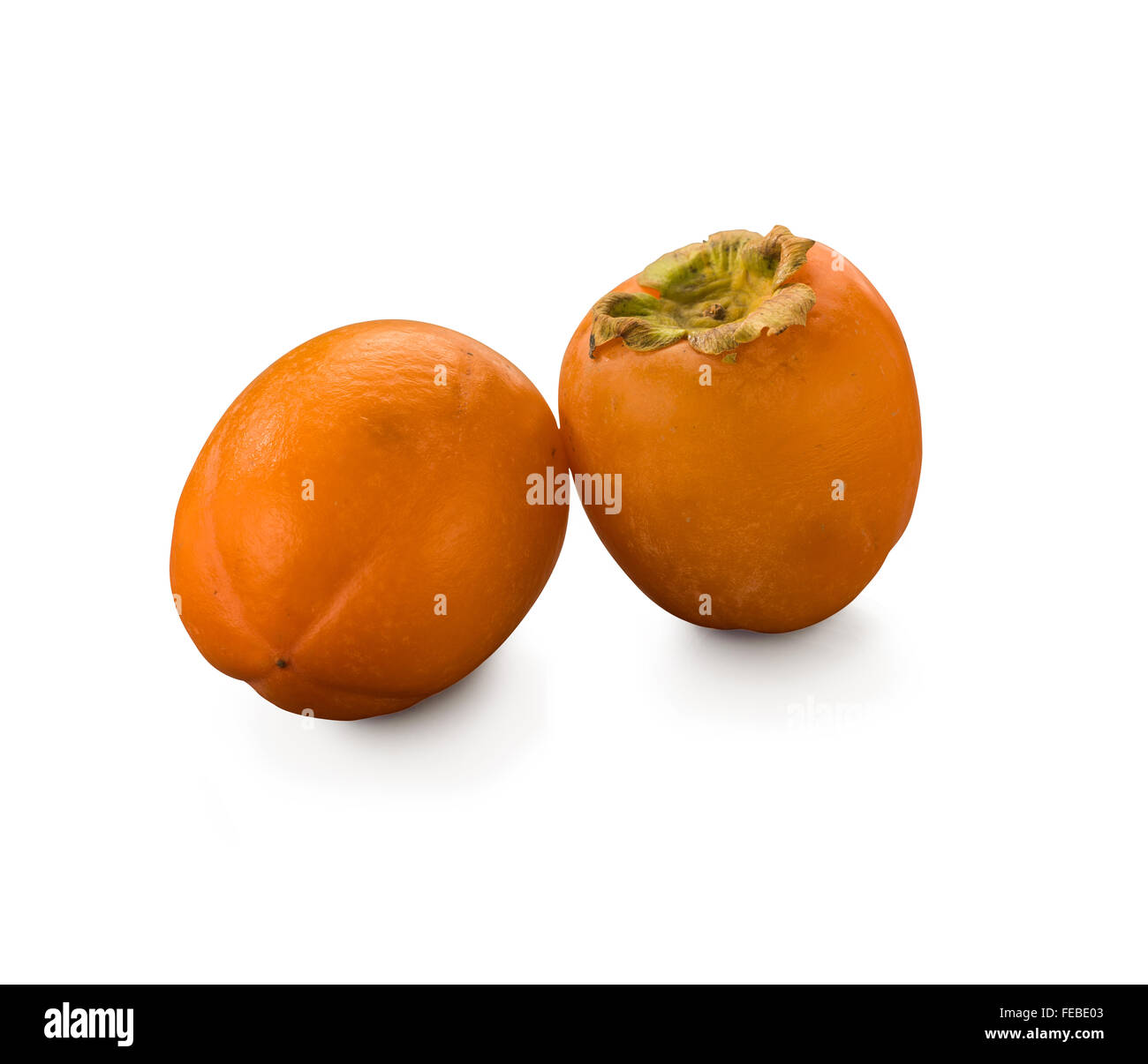 Organic Persimmons isolated on white Stock Photo - Alamy
