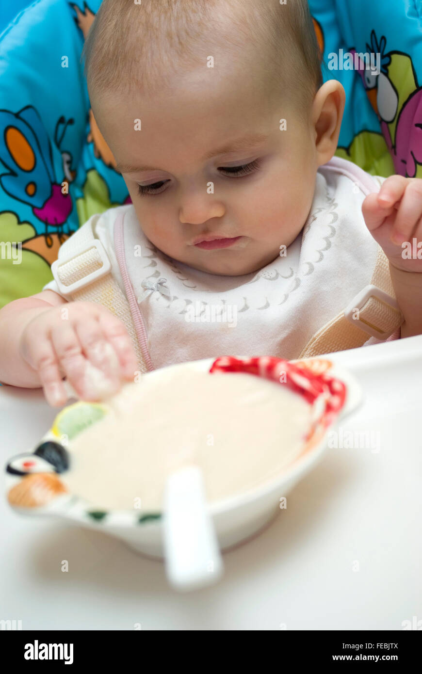 Chubby infant being fed hi-res stock photography and images - Alamy