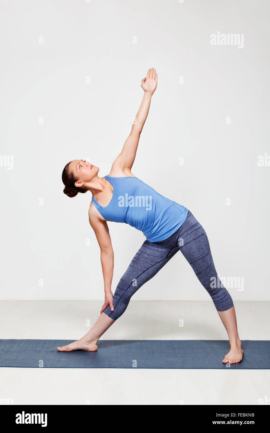 Trikonasana hi-res stock photography and images - Alamy