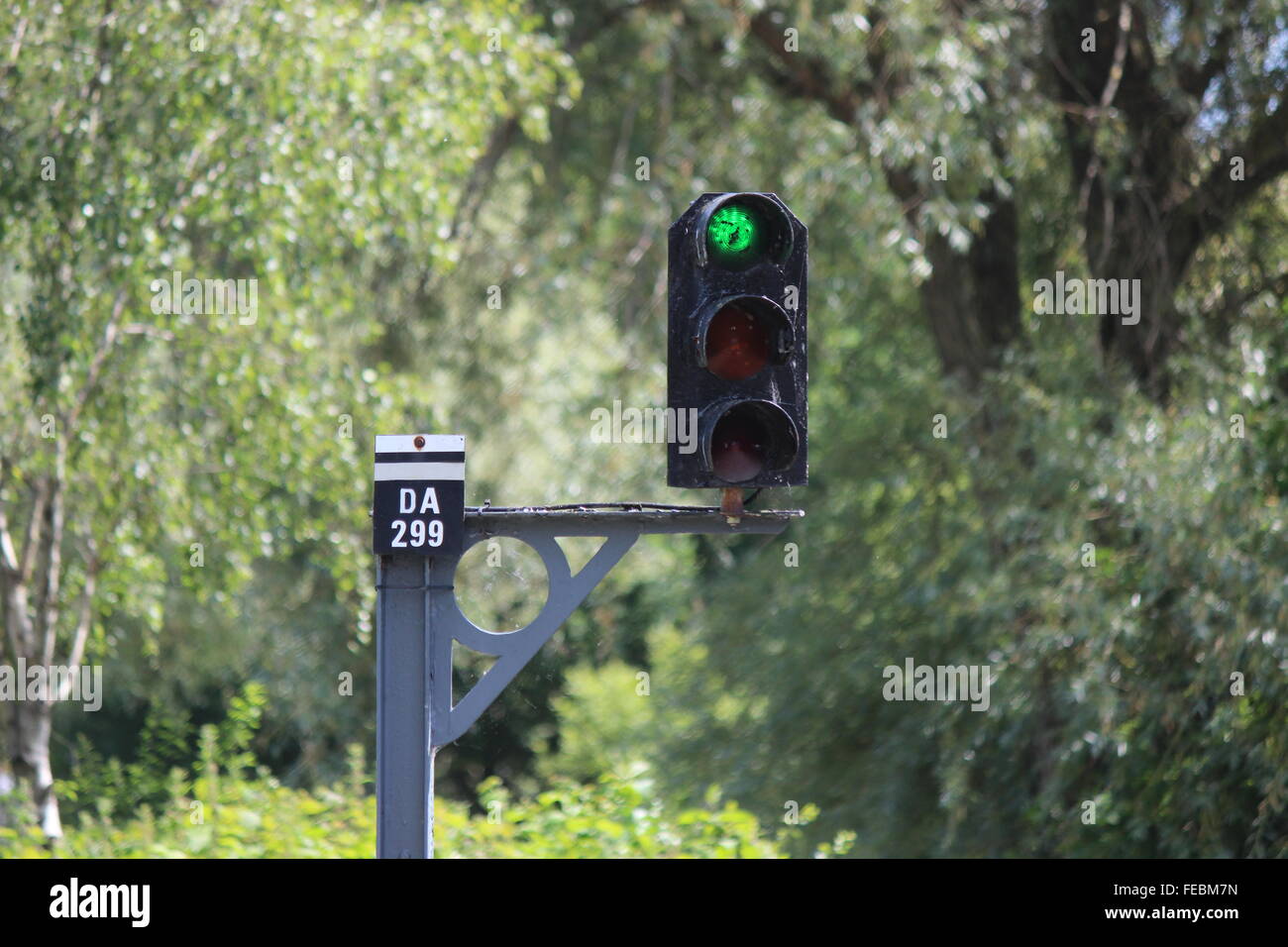 Railway signal lights green Stock Photo - Alamy
