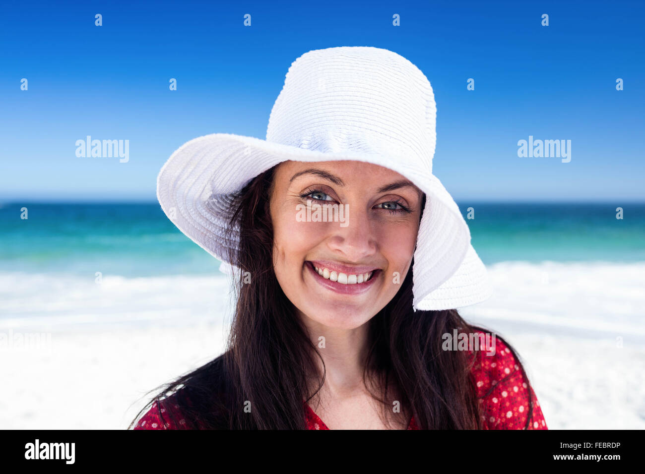 Pretty brunette with a hat Stock Photo - Alamy