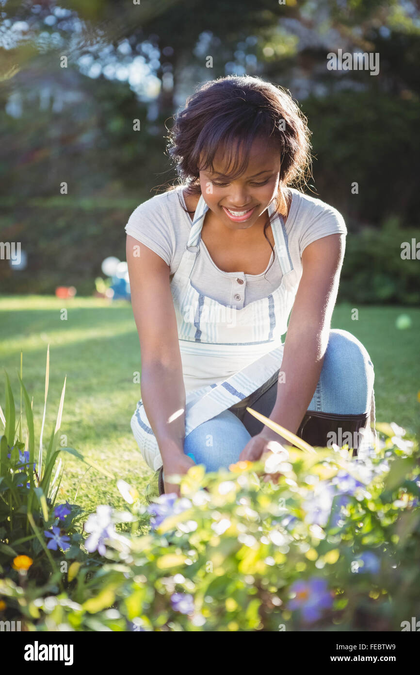 Pretty woman doing some gardening Stock Photo - Alamy