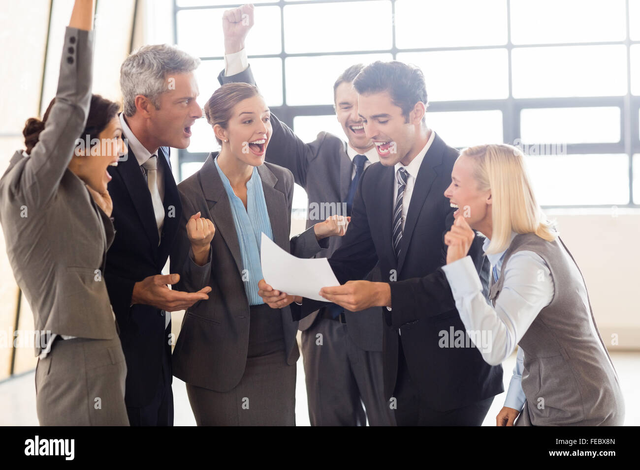 Business team cheering and shouting Stock Photo - Alamy
