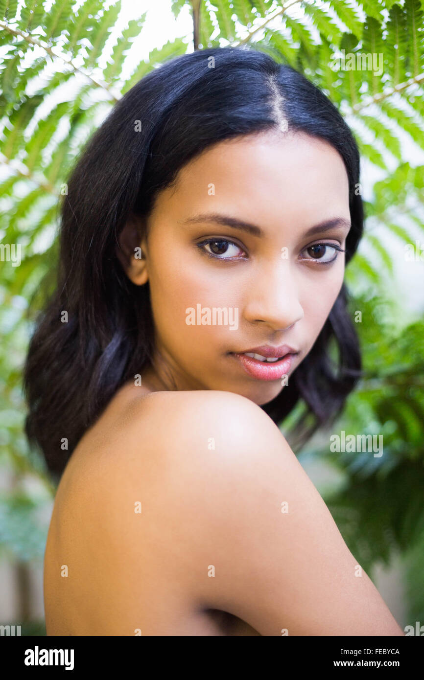 Portrait of a pretty woman staring Stock Photo - Alamy