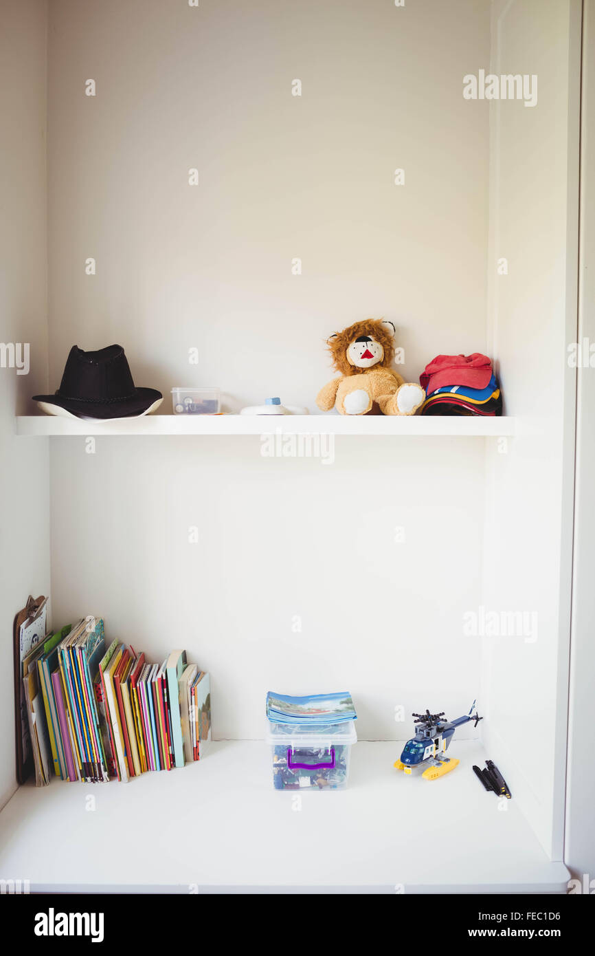 Shelf of childrens things Stock Photo - Alamy
