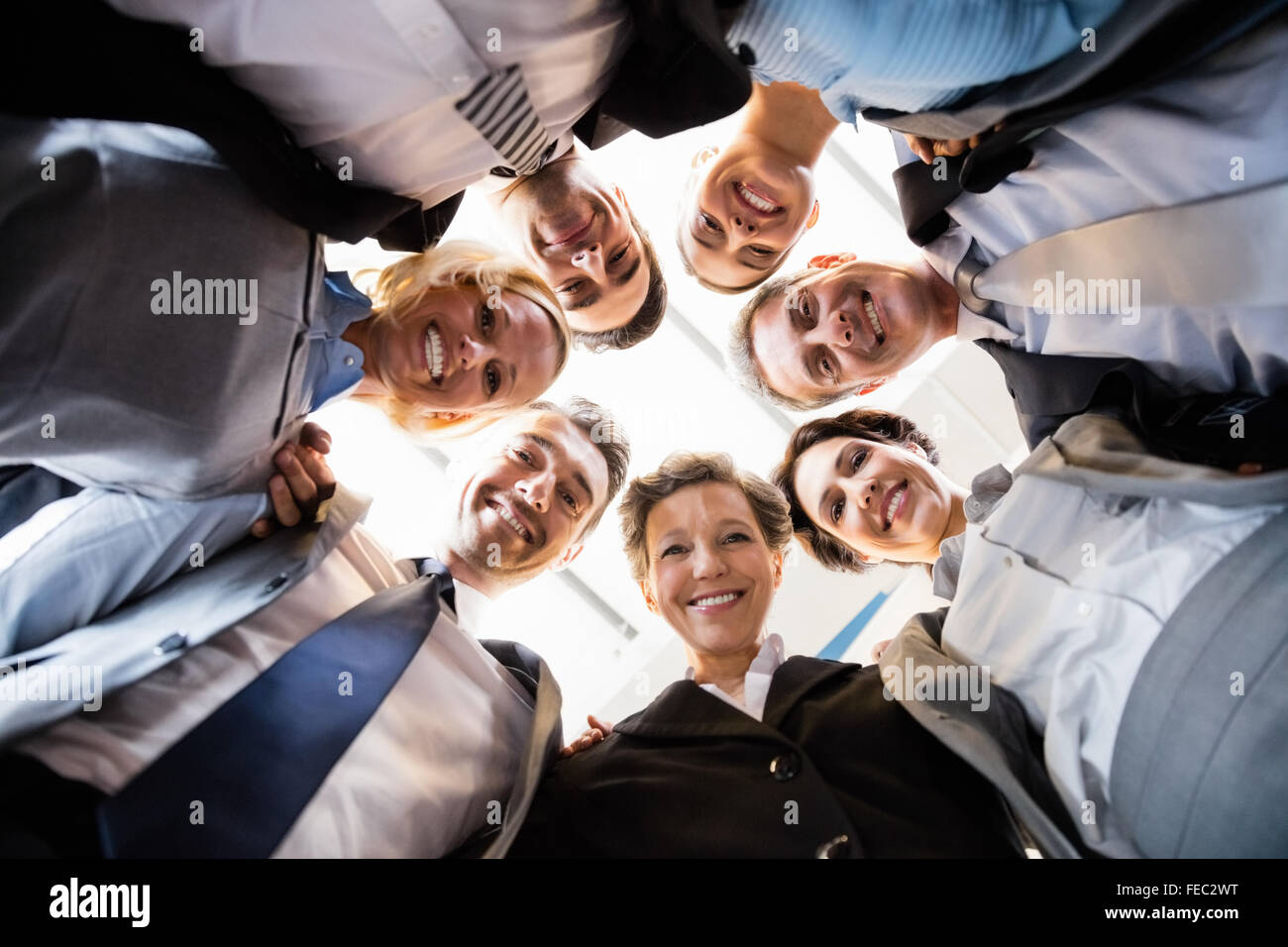 Business team standing in circle Stock Photo - Alamy