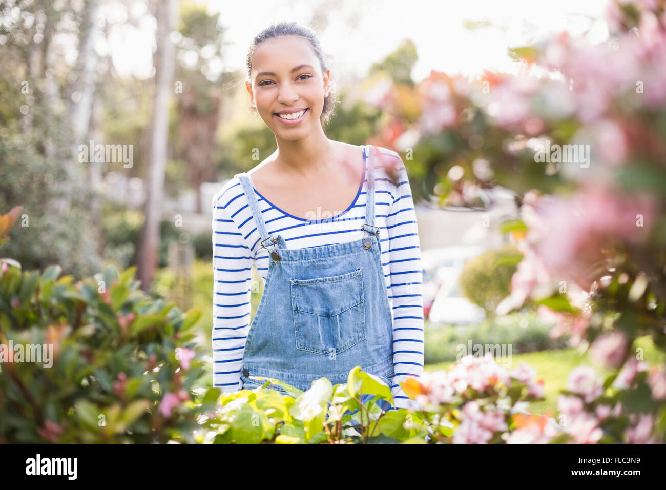 Happy brunette smiling in casual clothes Stock Photo - Alamy