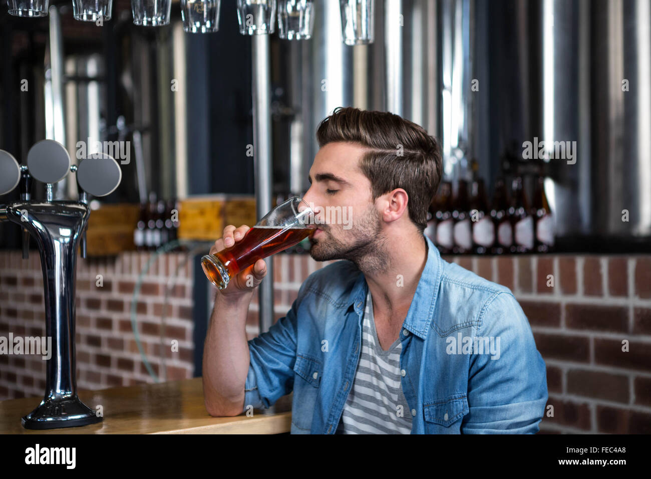 Man drinking pint hi-res stock photography and images - Alamy