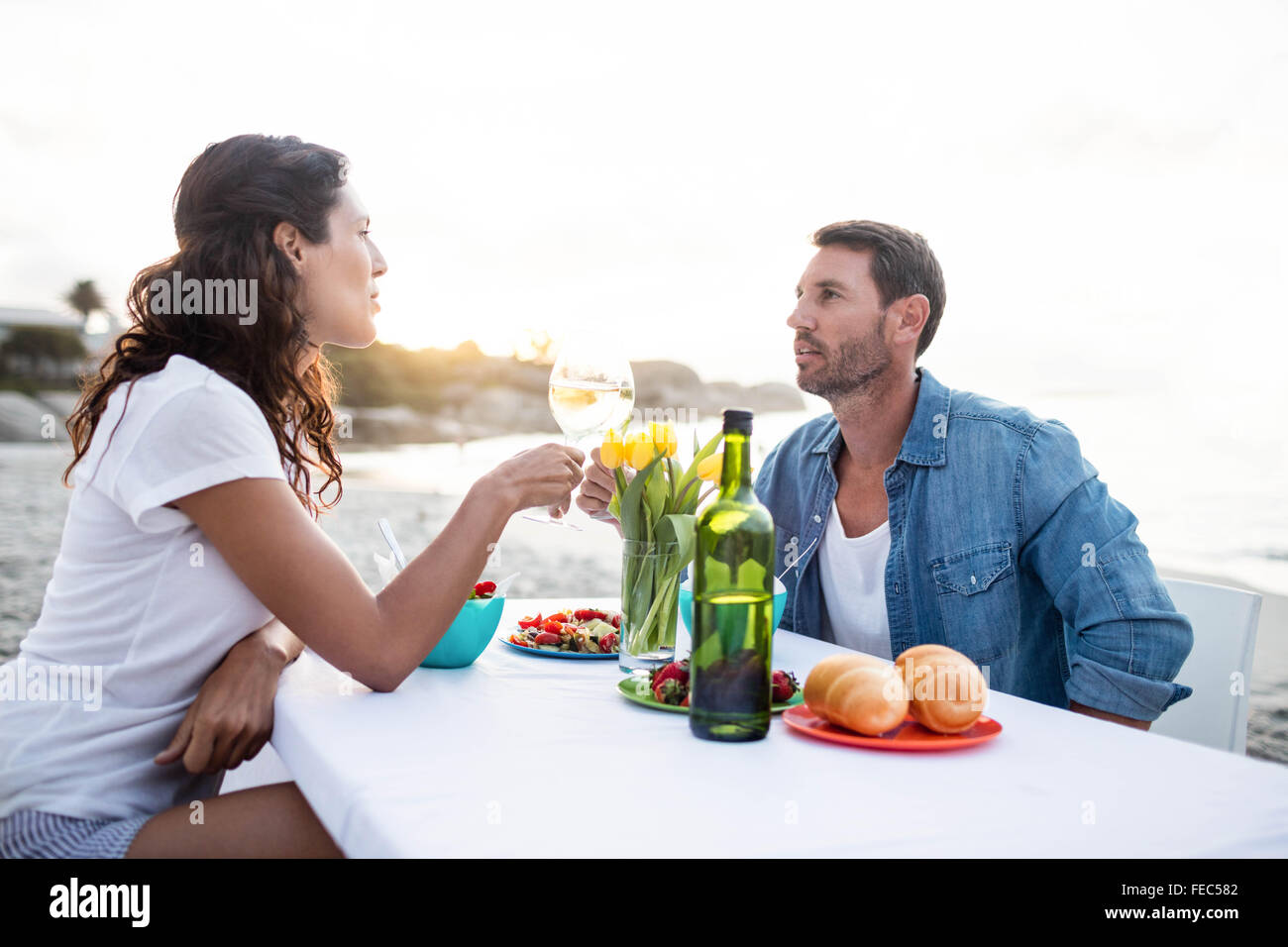 Cute couple having dinner Stock Photo - Alamy