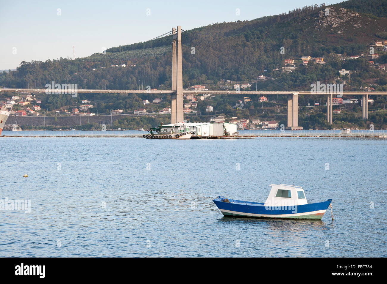 Fishing boat in Ria of Vigo, Galicia, Spain. Rande Bridge can be seen in the background Stock ...