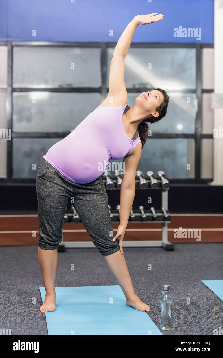 Pregnant women doing exercise on mat Stock Photo - Alamy
