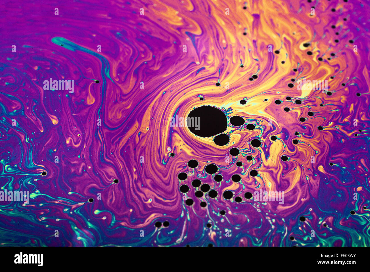 A glimpse of another colorful planet made with the pattern of a soap ...