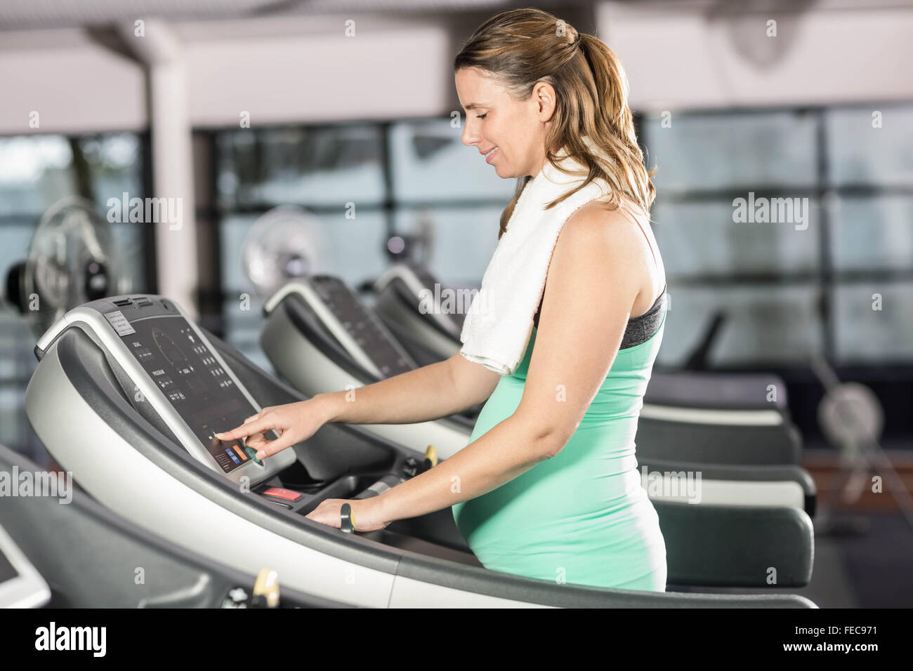 Woman using treadmill hi-res stock photography and images - Alamy