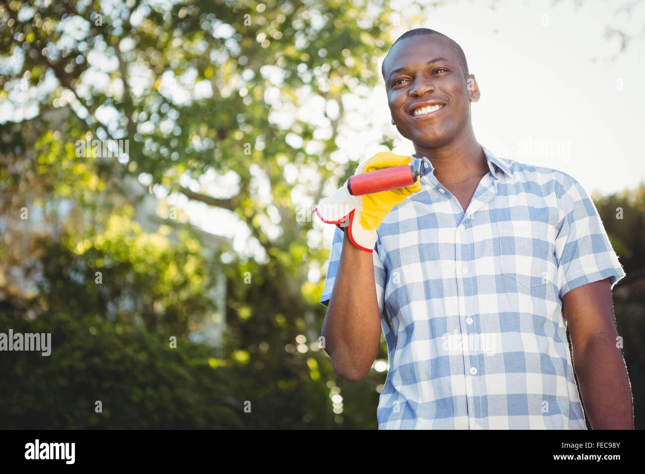 Man holding shovel hi-res stock photography and images - Alamy