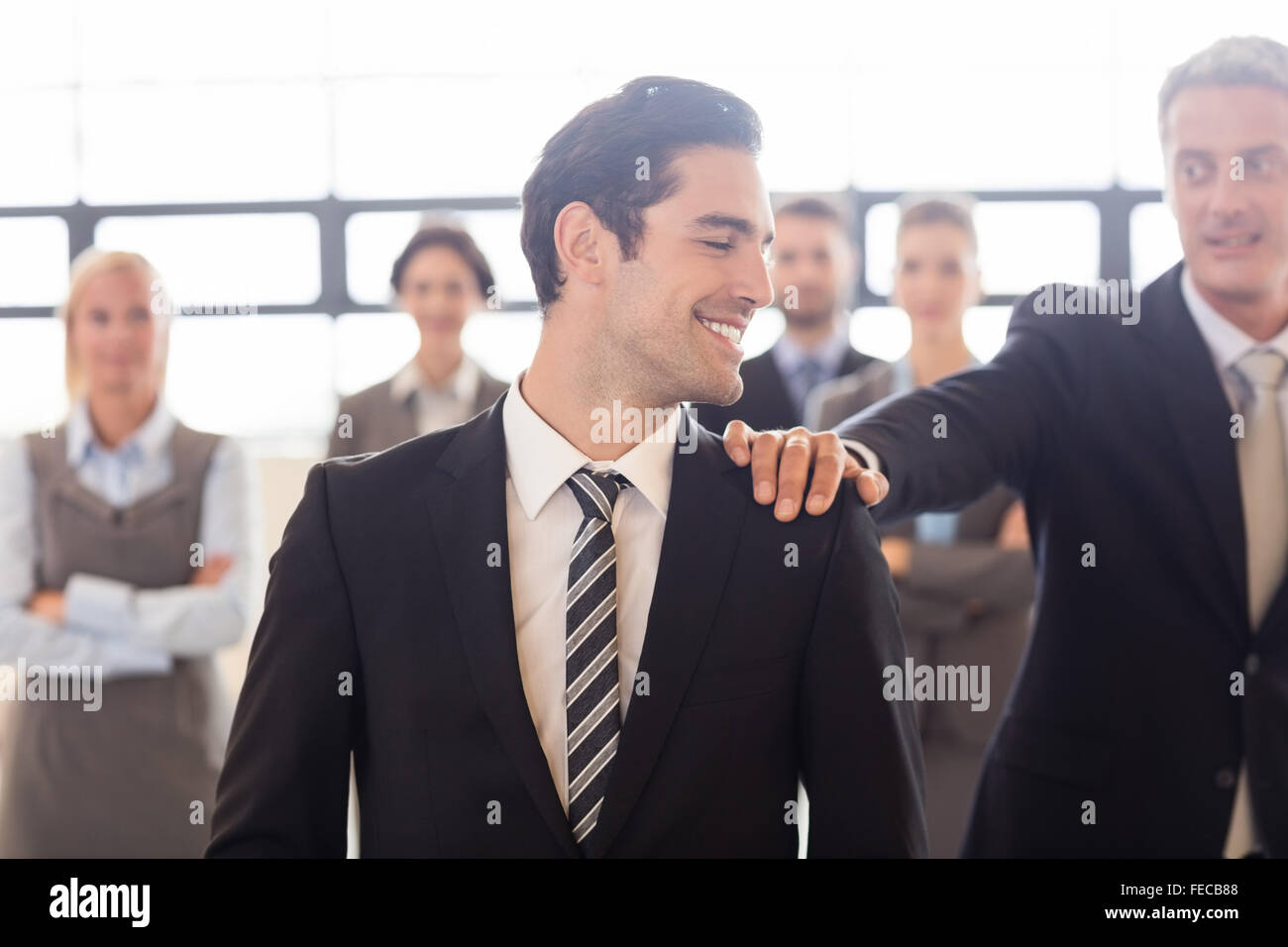 Touching shoulder hi-res stock photography and images - Alamy