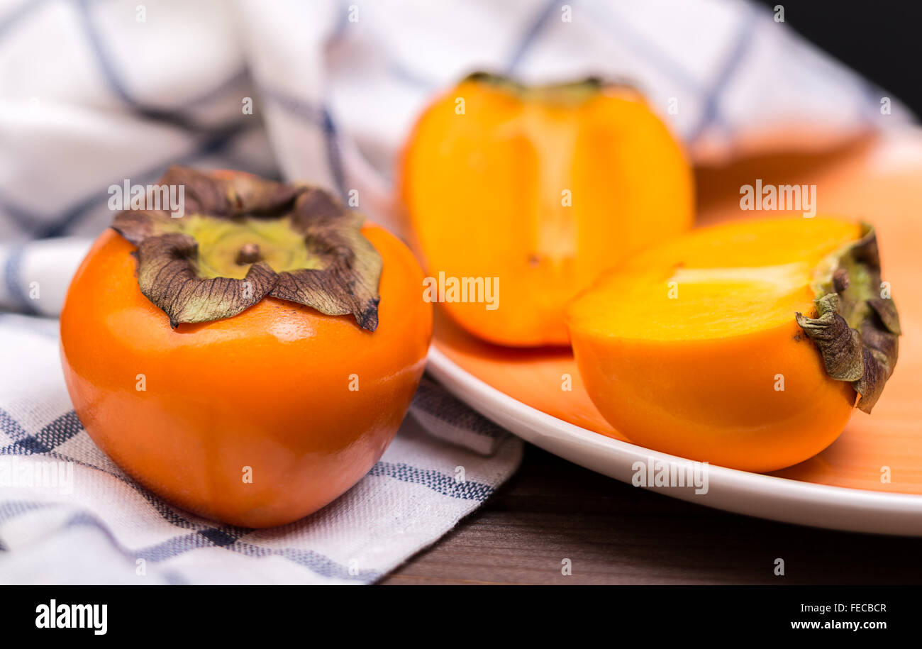 two ripe persimmons Stock Photo - Alamy