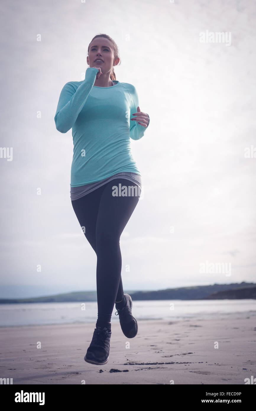 Beautiful brunette make a run Stock Photo - Alamy