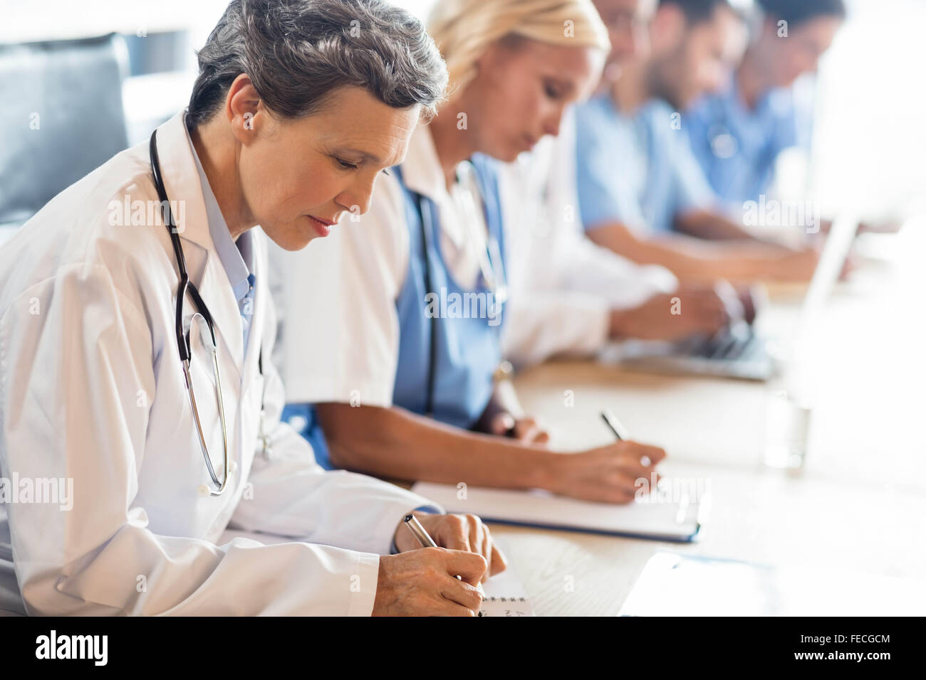 Medical team having a meeting Stock Photo - Alamy