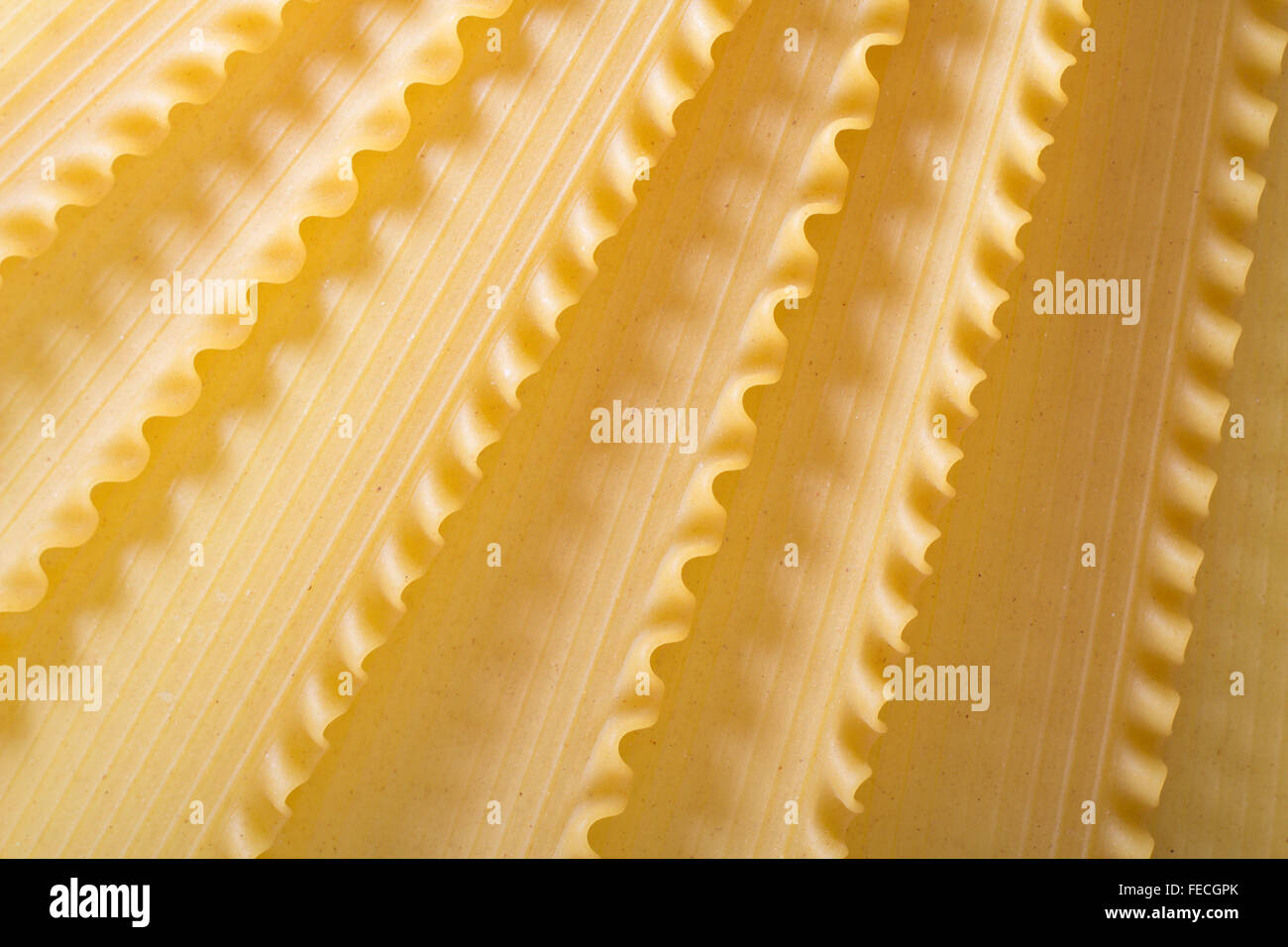 Lasagna sheets pasta background with pasta shapes Stock Photo - Alamy