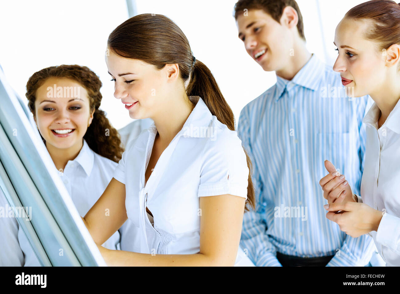 Image of business people at meeting discussing project Stock Photo - Alamy