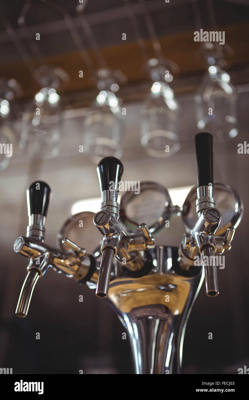 View of glasses and tap Stock Photo - Alamy