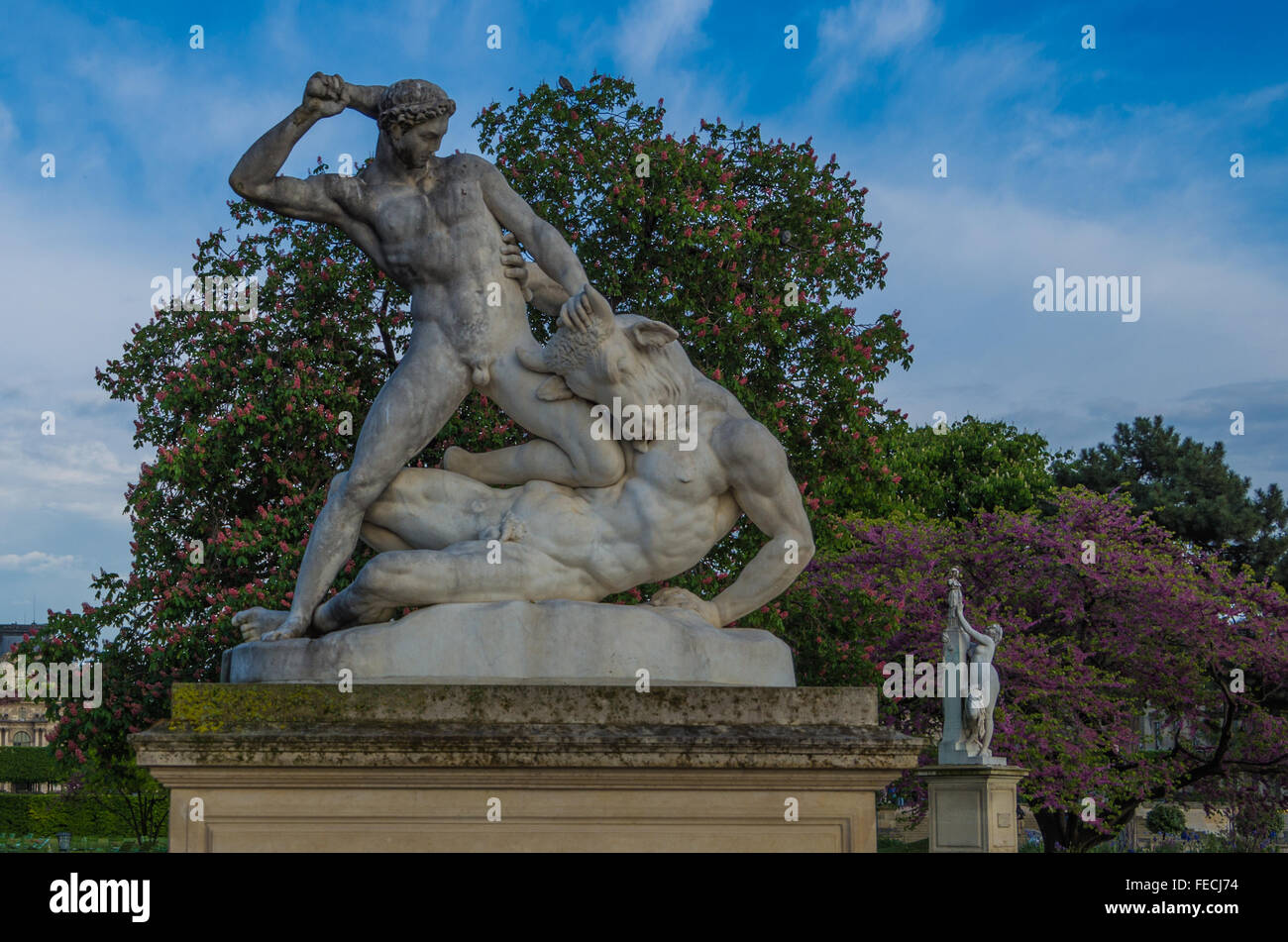 Classical statues adorn the public parks and gardens of Paris, France ...