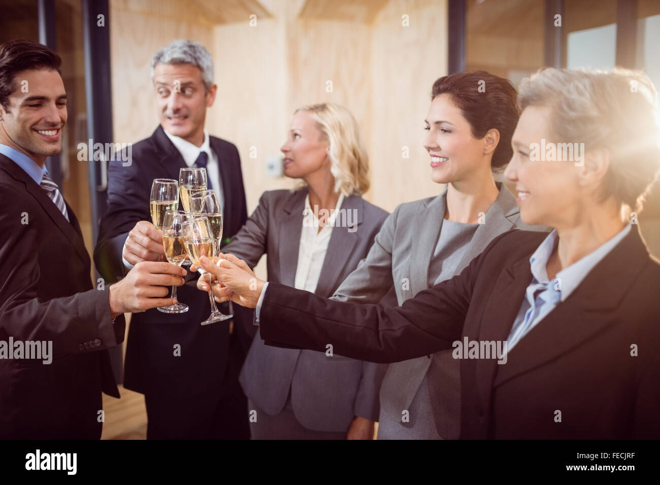 Successful business team toasting with champagne Stock Photo - Alamy