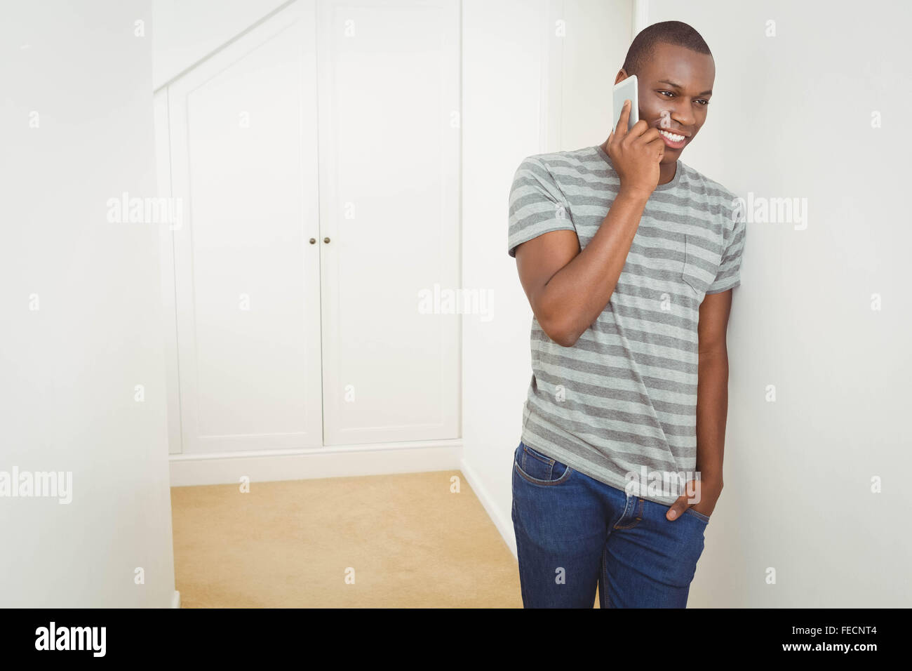 Handsome man having a phone call Stock Photo - Alamy