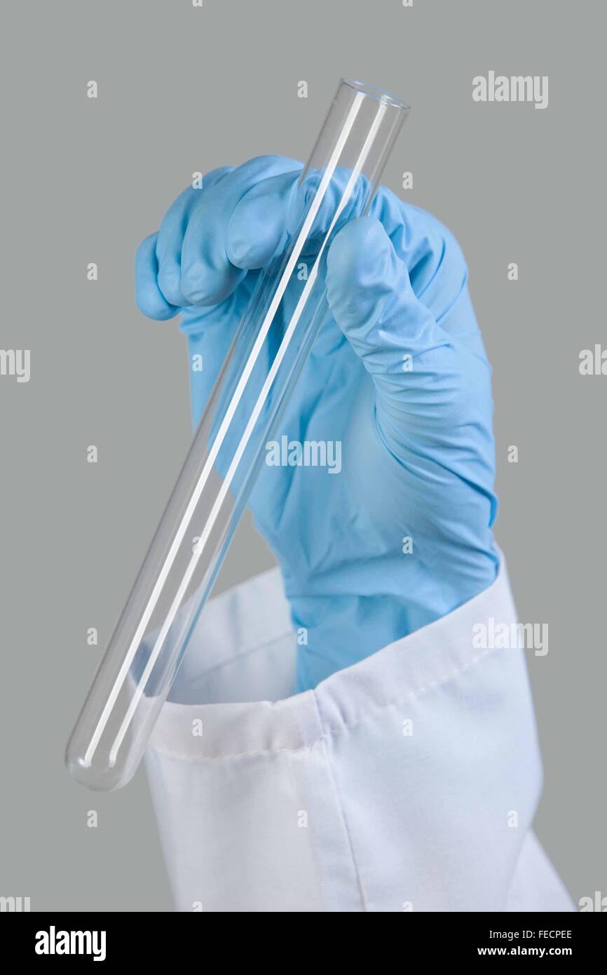 Close up image of scientist hands holding testing tube Stock Photo - Alamy