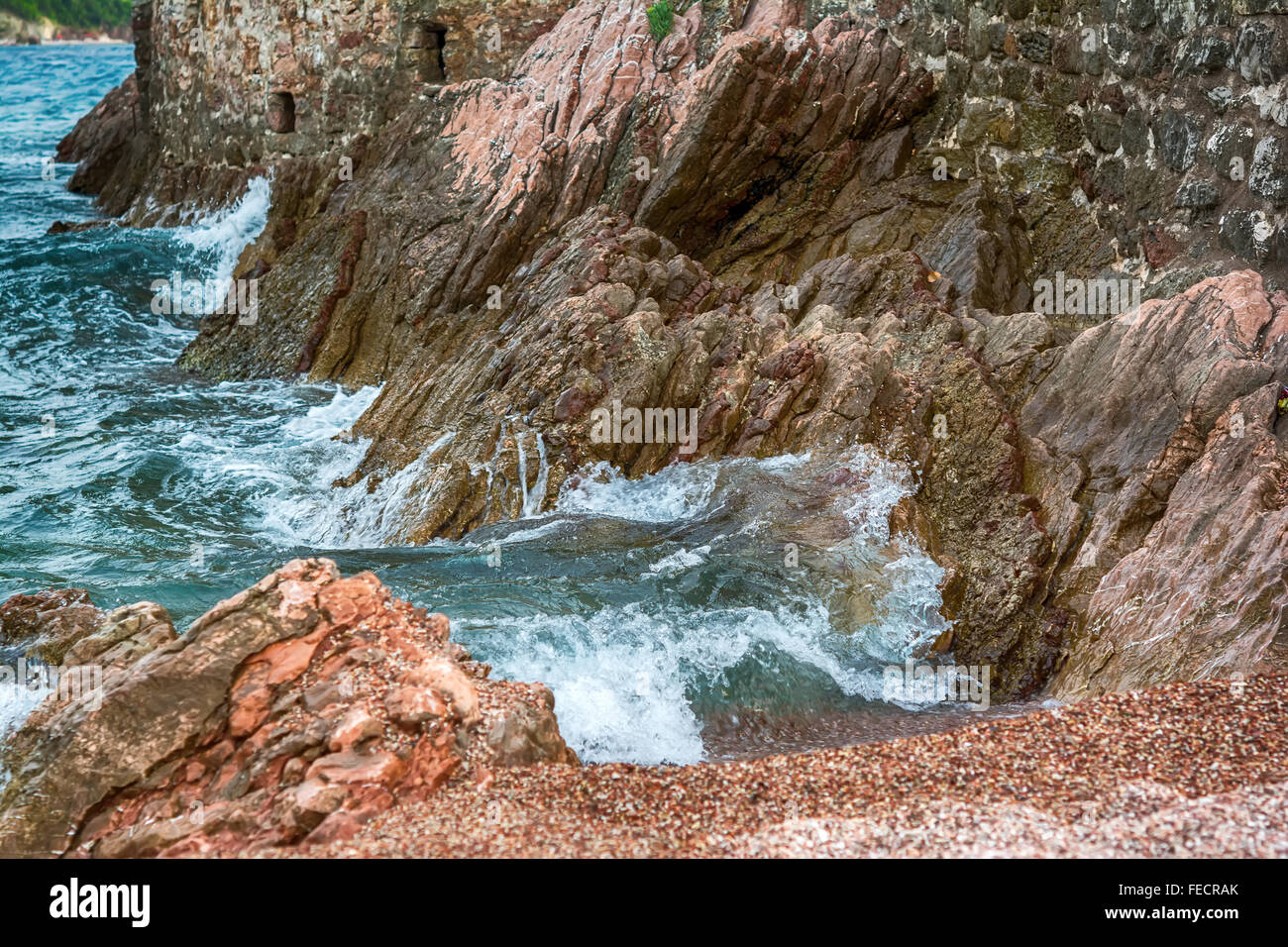 Rocks and stormy sea waves. Nature background Stock Photo - Alamy