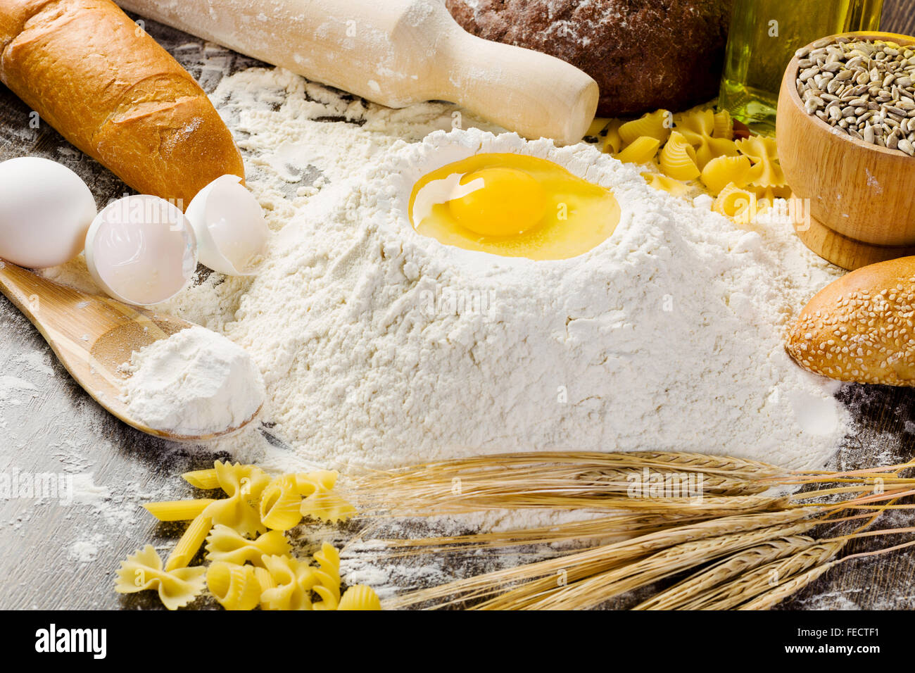 White bread drought and flour on kitchen table hi-res stock photography ...