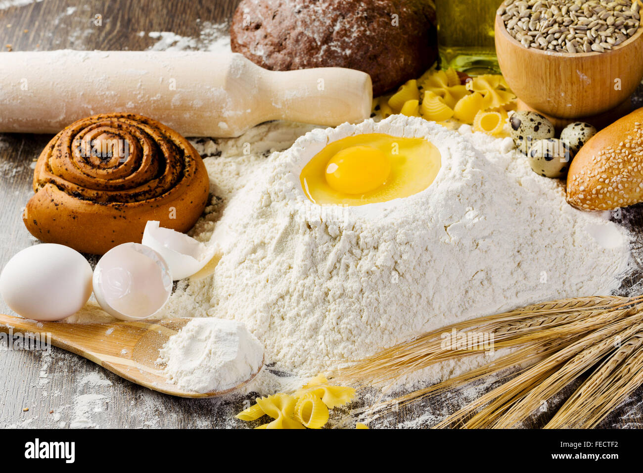 White bread drought and flour on kitchen table Stock Photo - Alamy