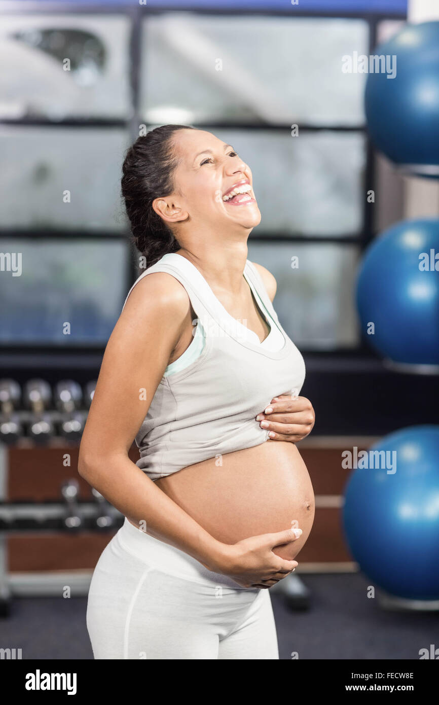 Pregnant woman showing belly hi-res stock photography and images - Alamy