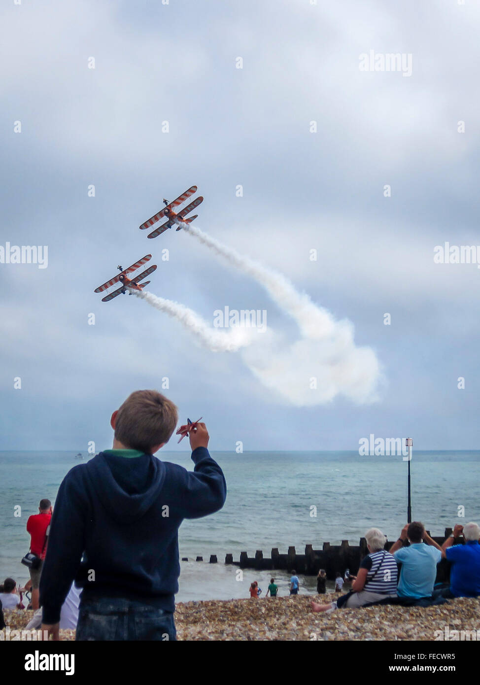 Boy watches and air show Stock Photo - Alamy