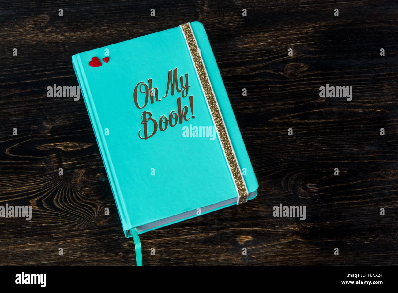 Diary and two small red hearts Stock Photo - Alamy