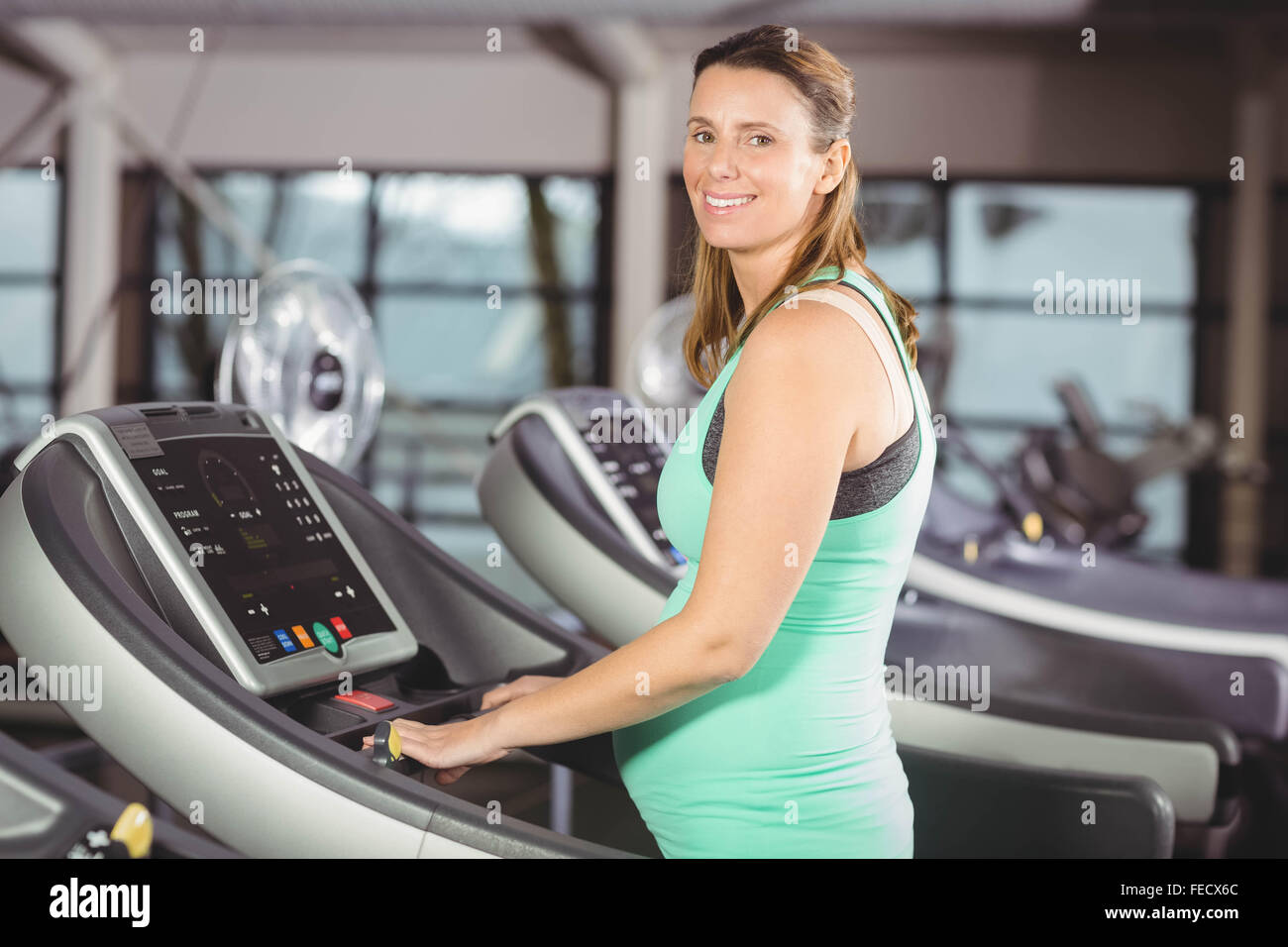 Woman using treadmill hi-res stock photography and images - Alamy