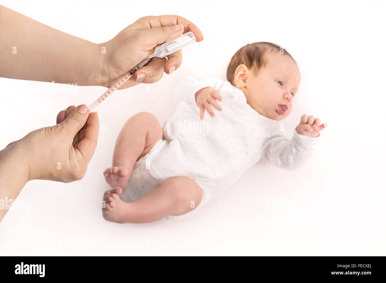 Pediatrician ready to give a one month baby girl intramuscular ...