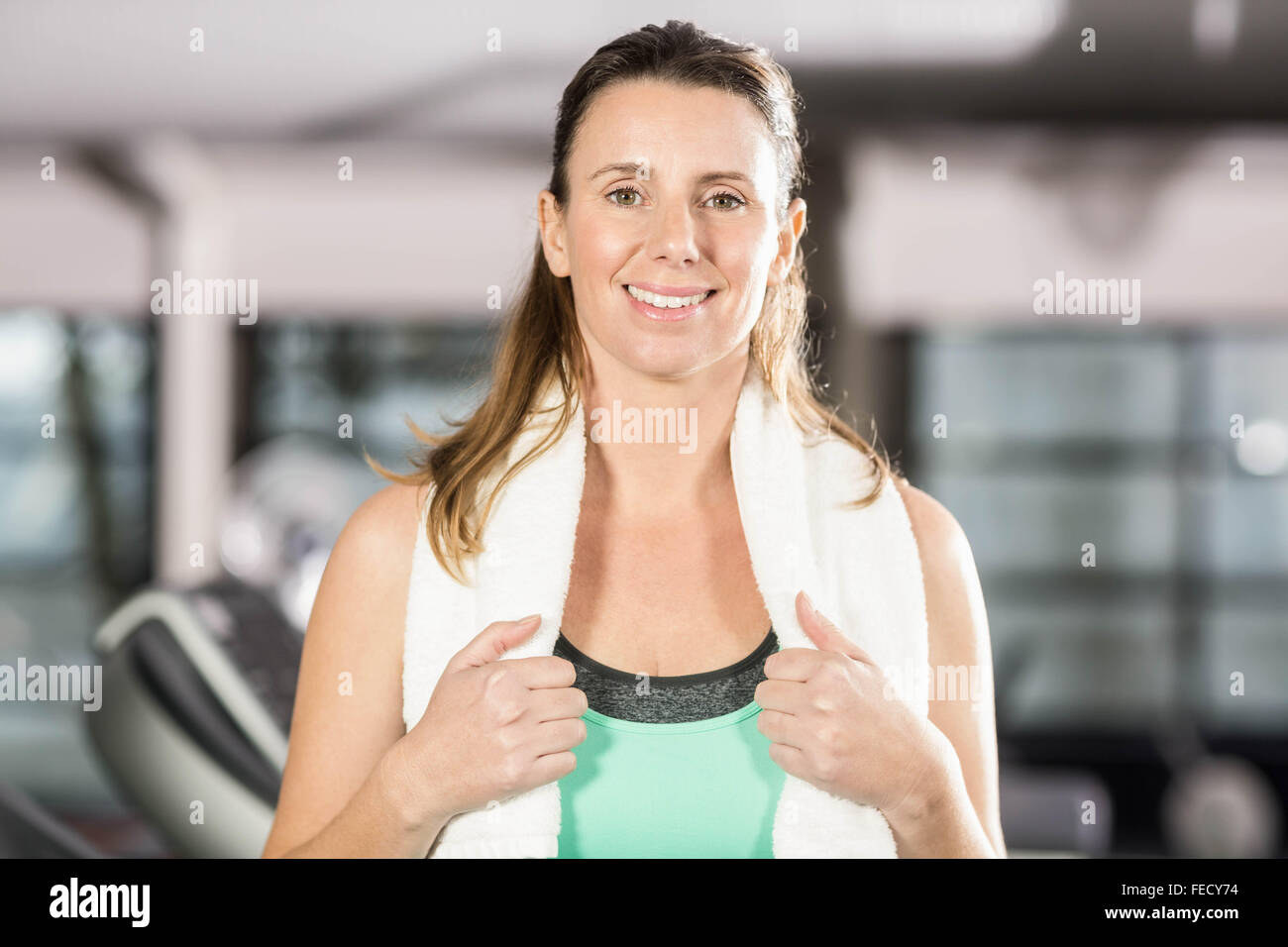 Woman holding towel hi-res stock photography and images - Alamy