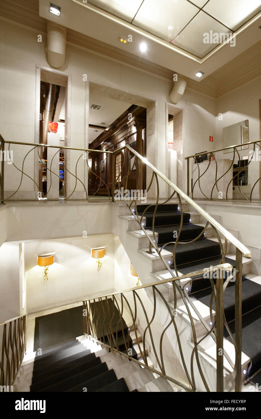 Interior luxury apartment with illuminated stair. Vertical Stock Photo ...