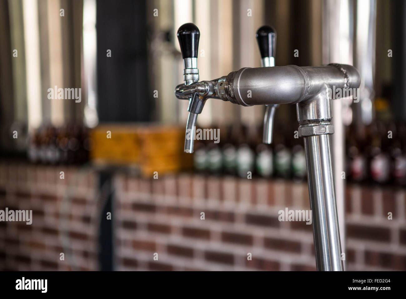 Beer pouring machine Stock Photo - Alamy