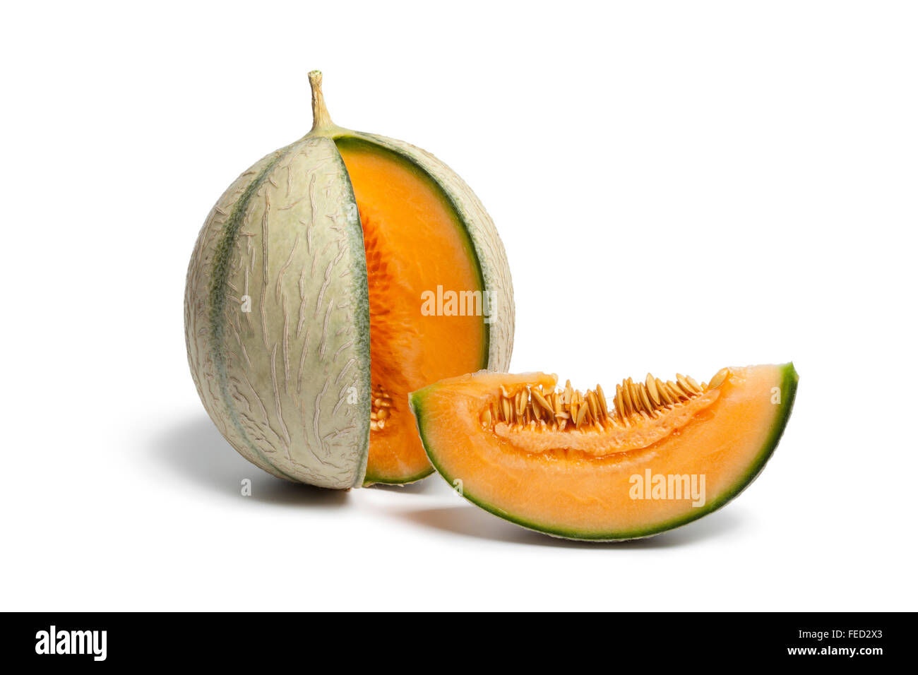 Fresh ripe Charentais melon with a piece on white background Stock ...